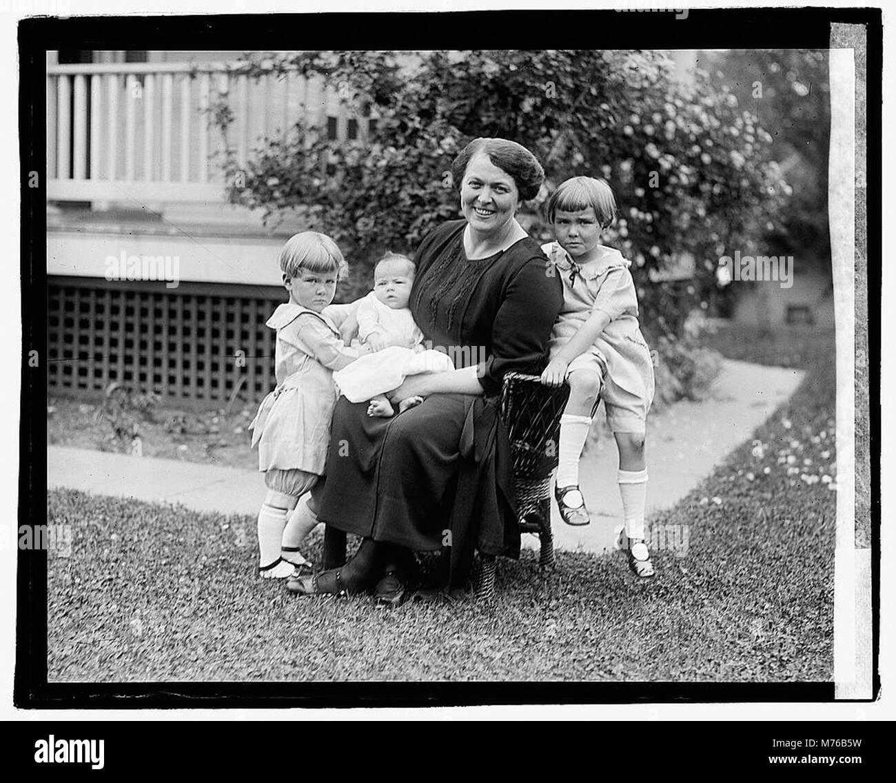 A photograph of Mrs. Clyde Kelly with her children, likely from the ...