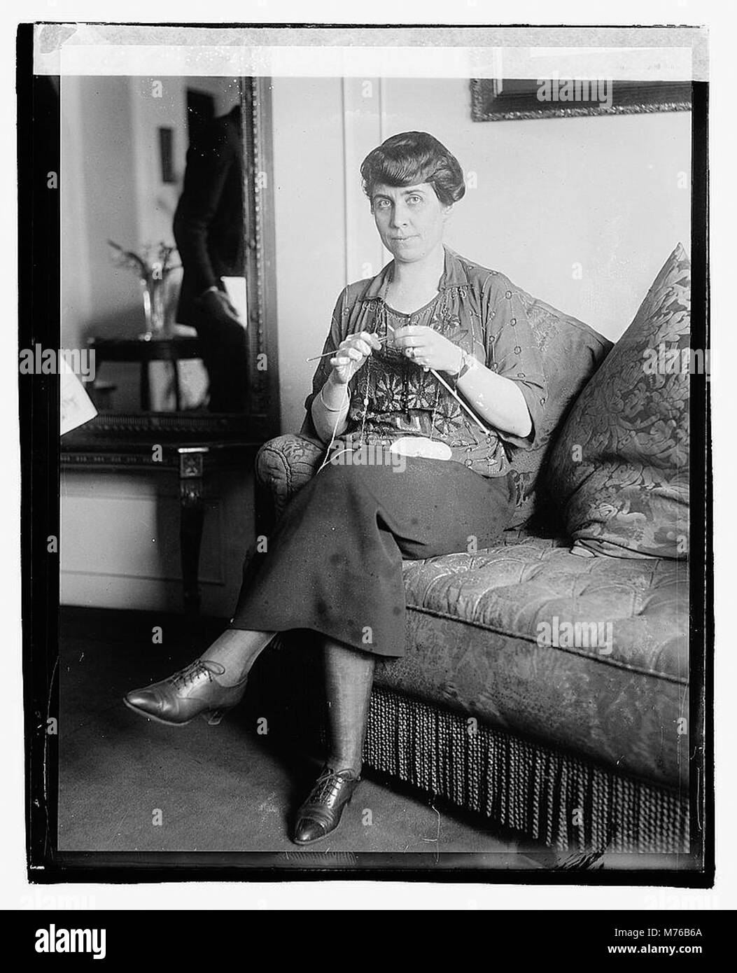 A portrait of Mrs. Coolidge, capturing her elegance and role as the ...