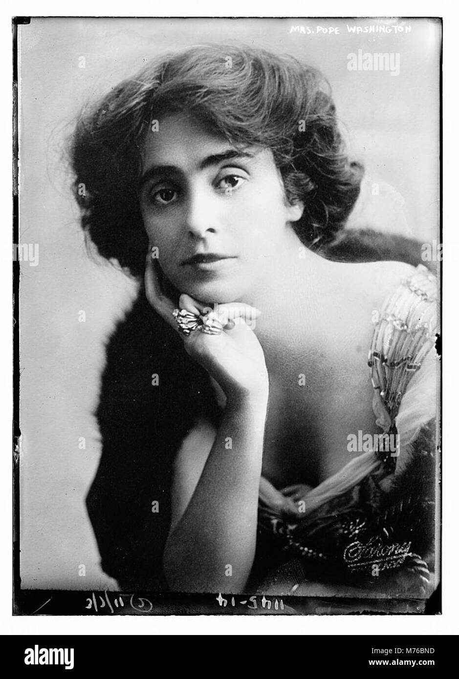 A historical photograph of Mrs. Pope Washington, reflecting her social ...