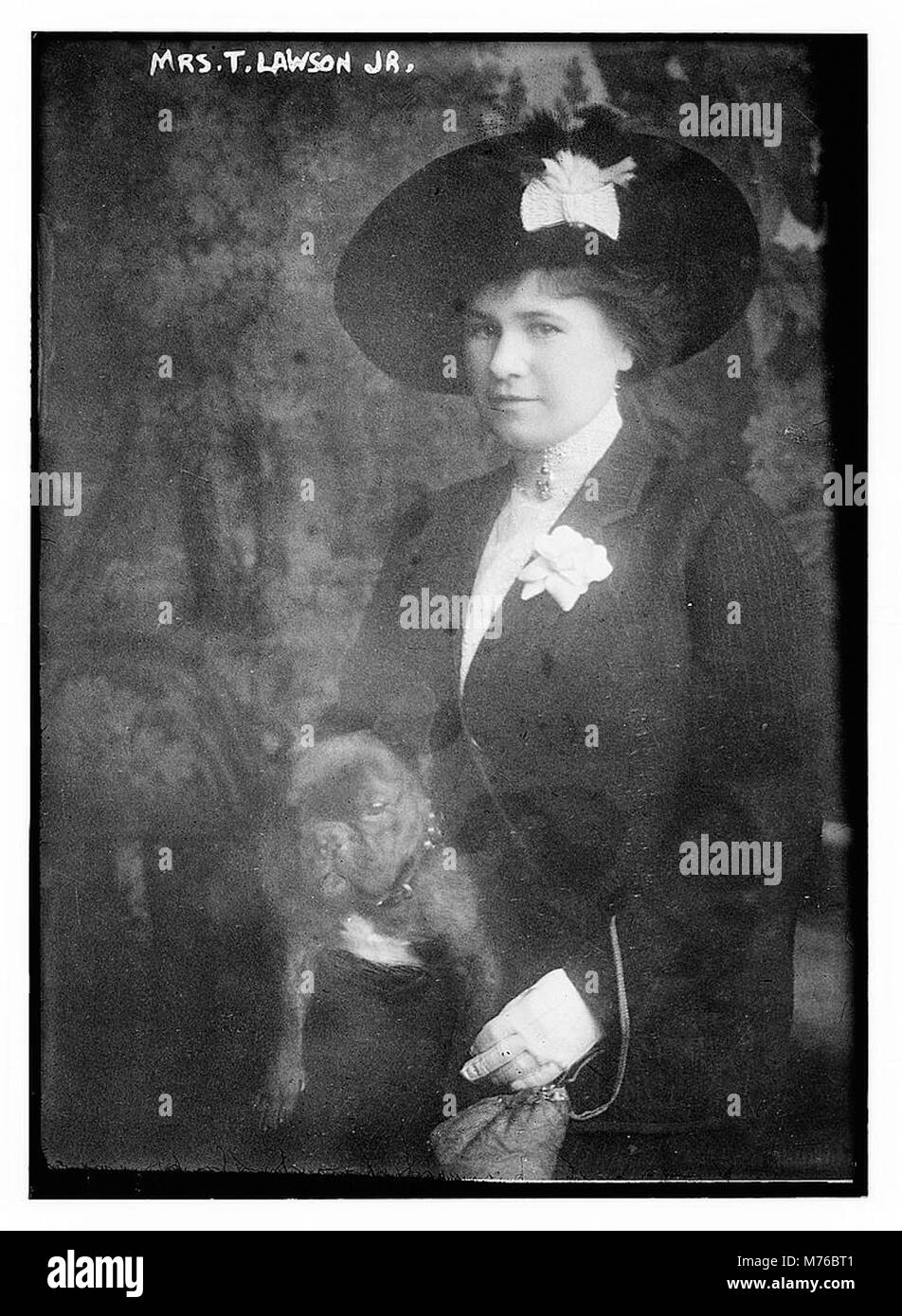 This portrait captures Mrs. T. Lawson Jr., offering a glimpse into her ...