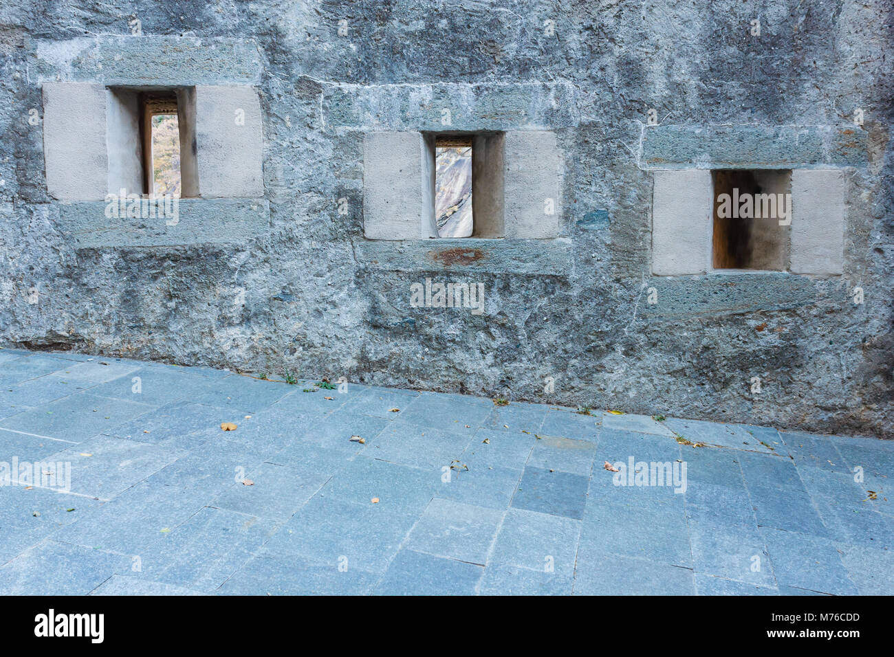 series of slits of an ancient castle / the slits were openings in the ...