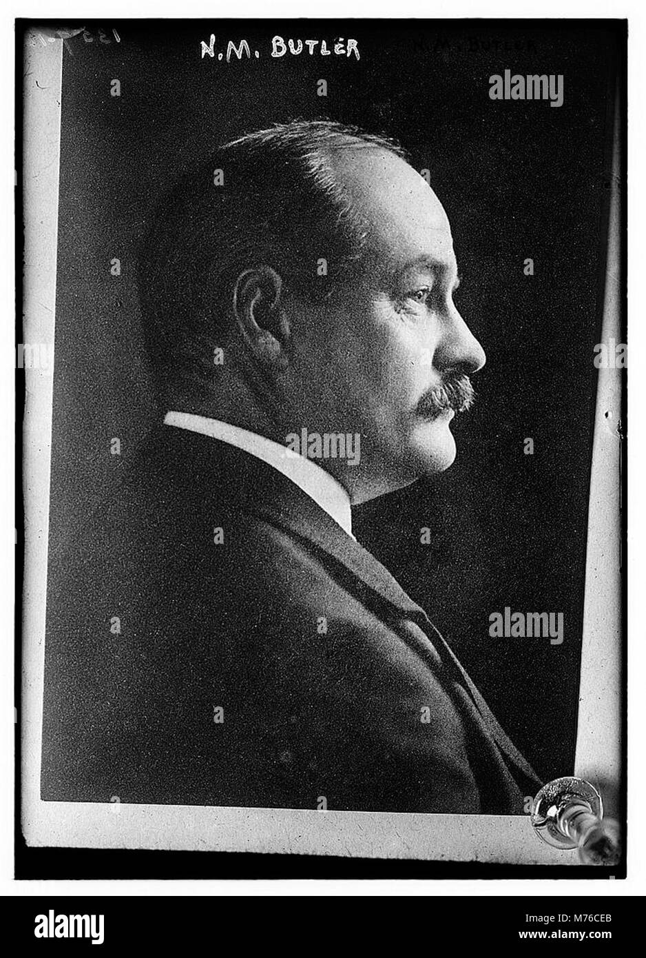 A historical portrait of N.M. Butler, showcasing a figure from the ...