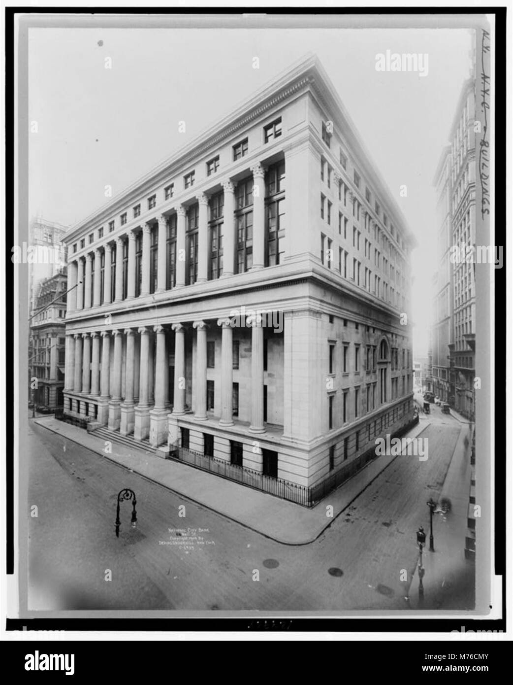 A historical photograph of the National City Bank building on Wall ...