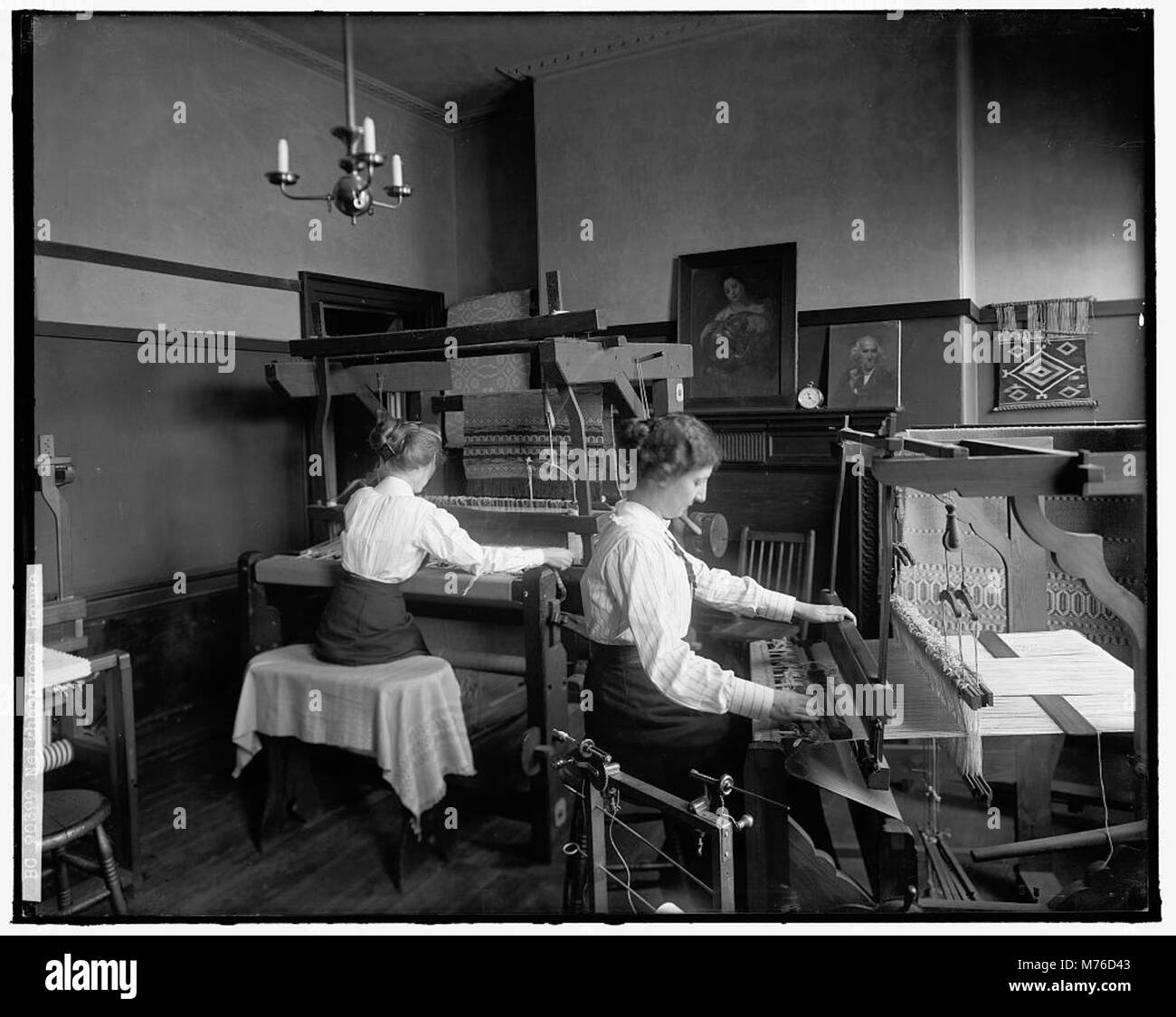 A photograph of a community weaving project at the Neighborhood House ...