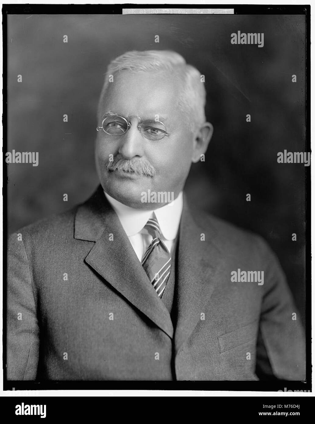 A portrait of Dr. E.W. Nelson, a notable figure in medicine, showcasing ...