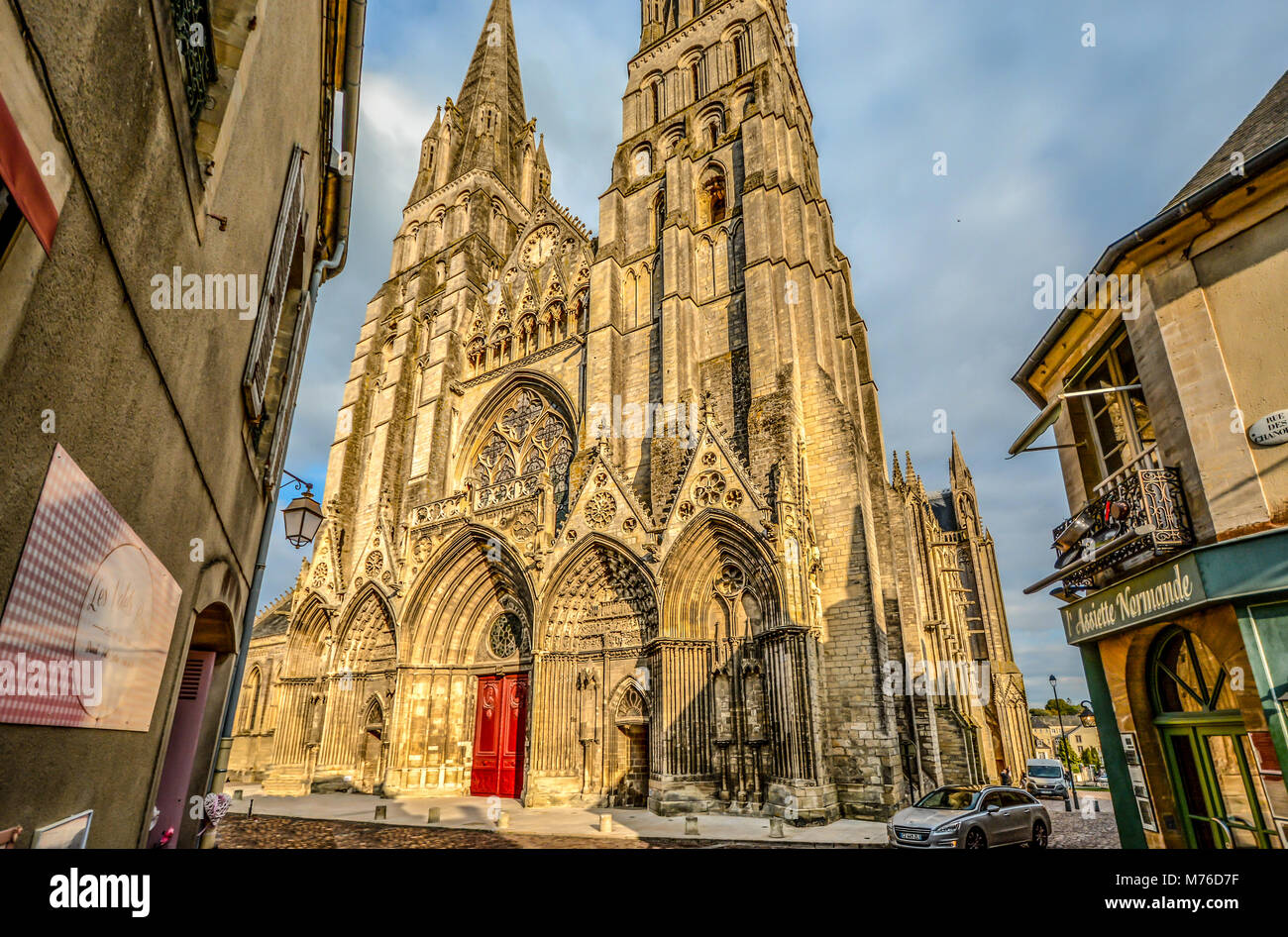 The impressive facade of the Our lady of Bayeux cathedral in the town ...