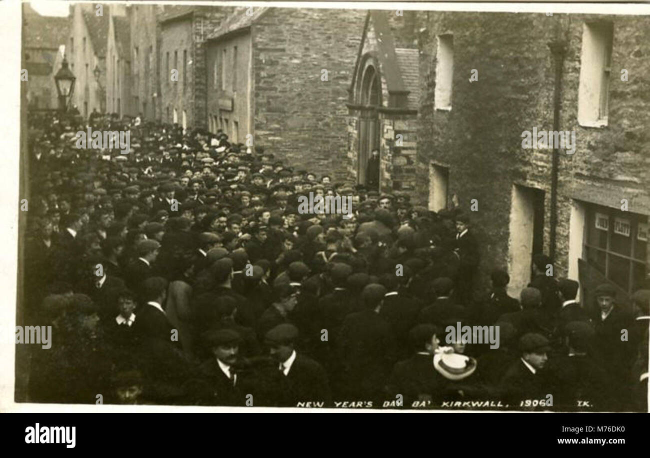 A photograph of a large crowd participating in New Year's Day Ba' games ...