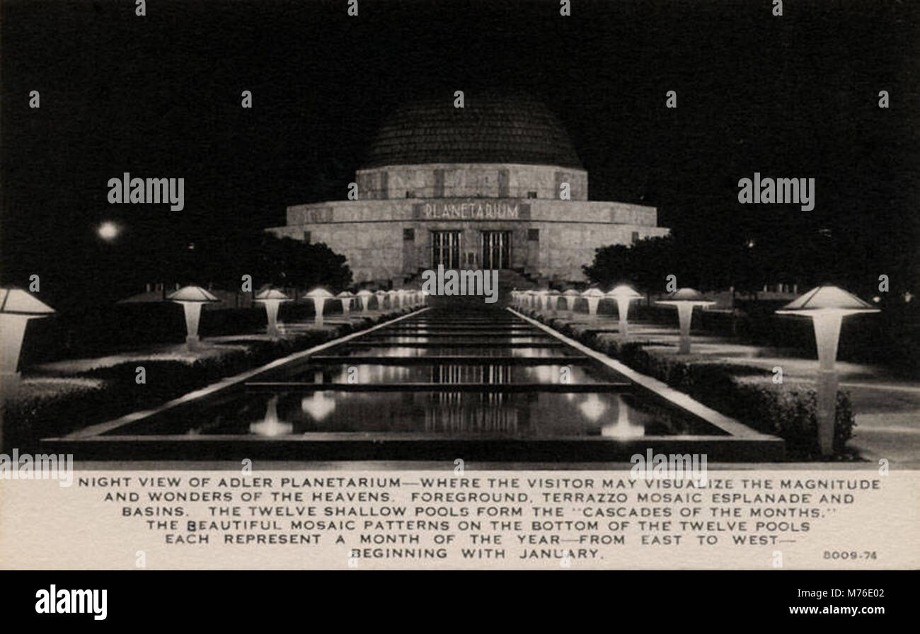 This image showcases a night view of the Adler Planetarium in Chicago ...
