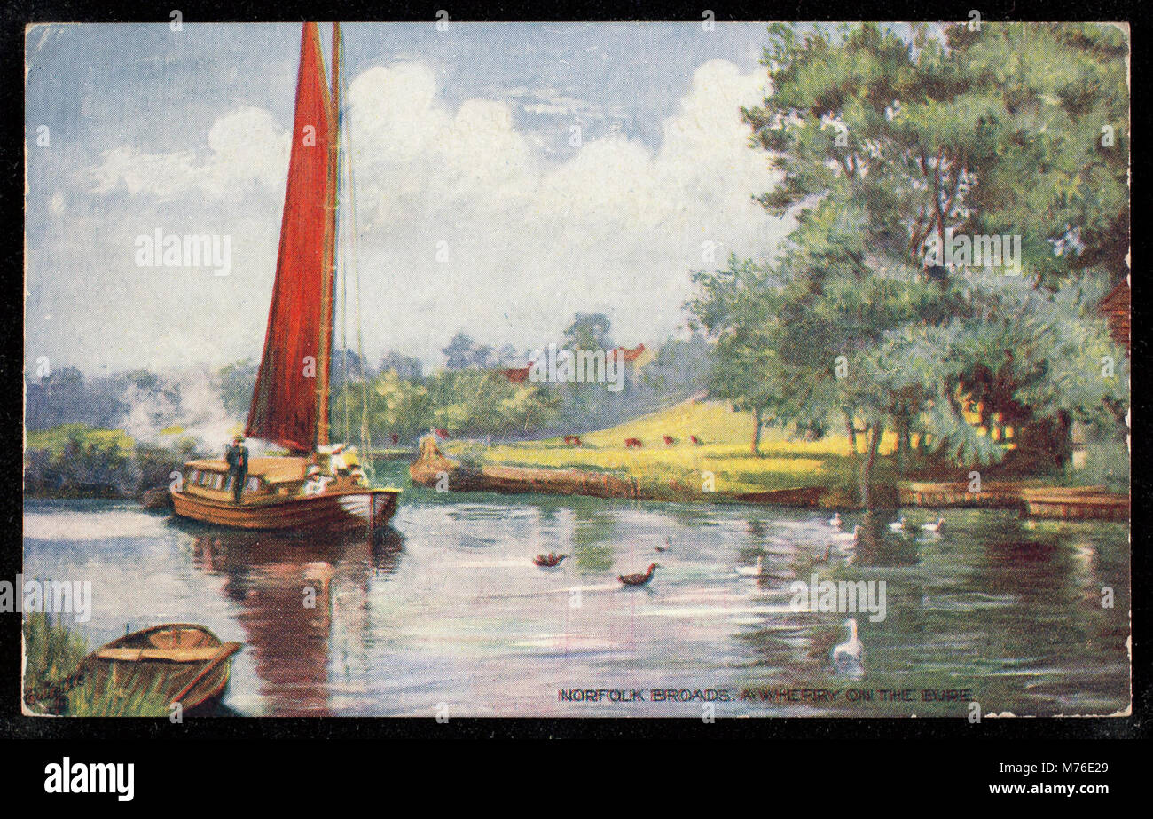 A traditional wherry boat navigates the Bure River in the Norfolk ...