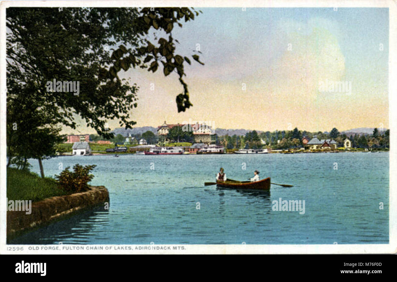 A scenic view of Old Forge in the Fulton Chain of Lakes, highlighting ...