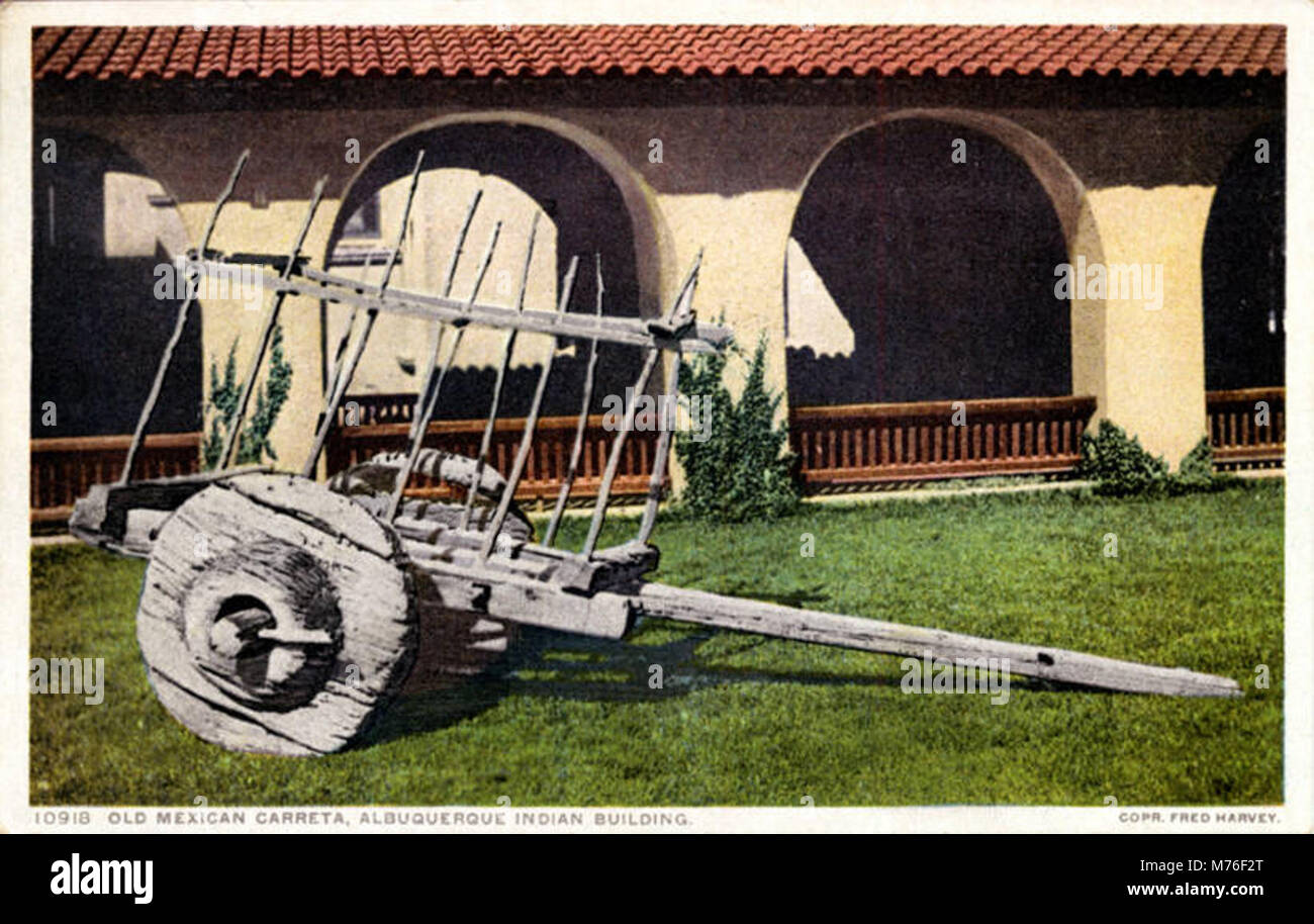 The image shows an old Mexican carreta, a traditional wooden cart that ...