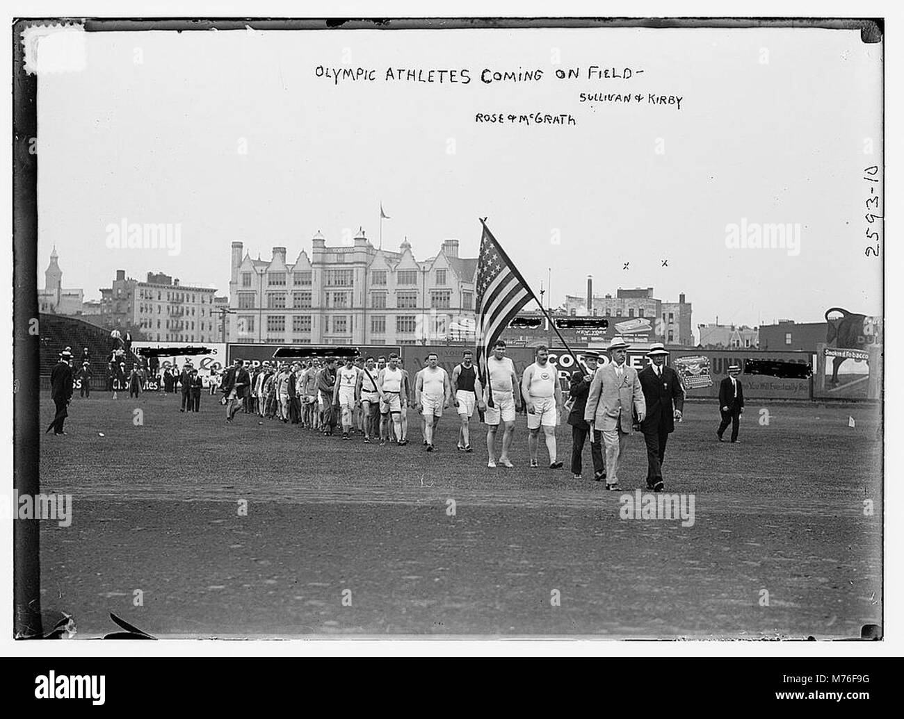 A photograph of Olympic athletes entering the field, ready to compete ...