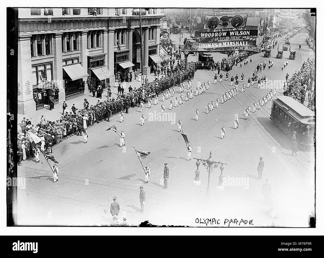 A photograph capturing the Olympic parade, showcasing athletes and the ...