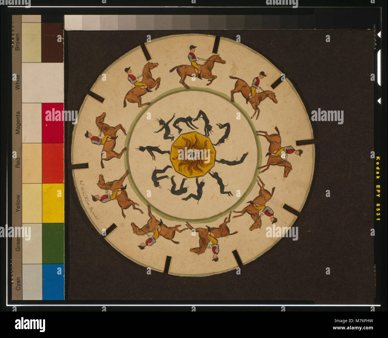 An optical illusion disc featuring images of somersaults and horseback ...