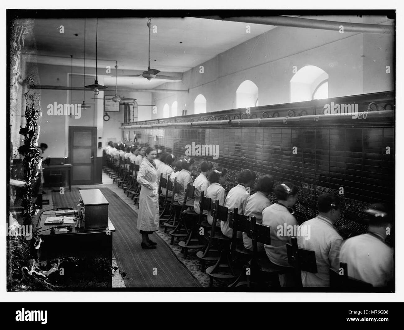 A panoramic photograph of a telephone company's switchboard, showcasing ...