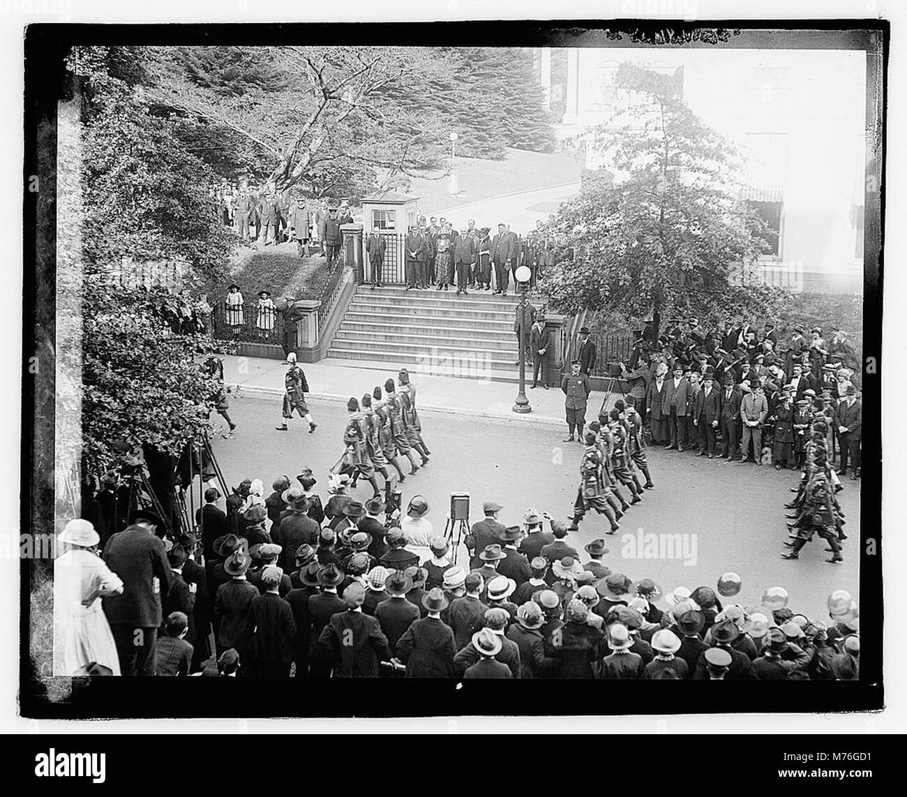 A photograph of a parade, capturing the celebratory atmosphere of the ...