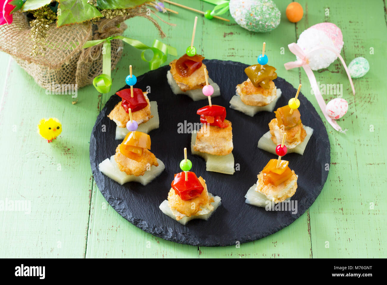 Easter recipe, festive appetizer. Canapes with pineapple, grill chicken ...