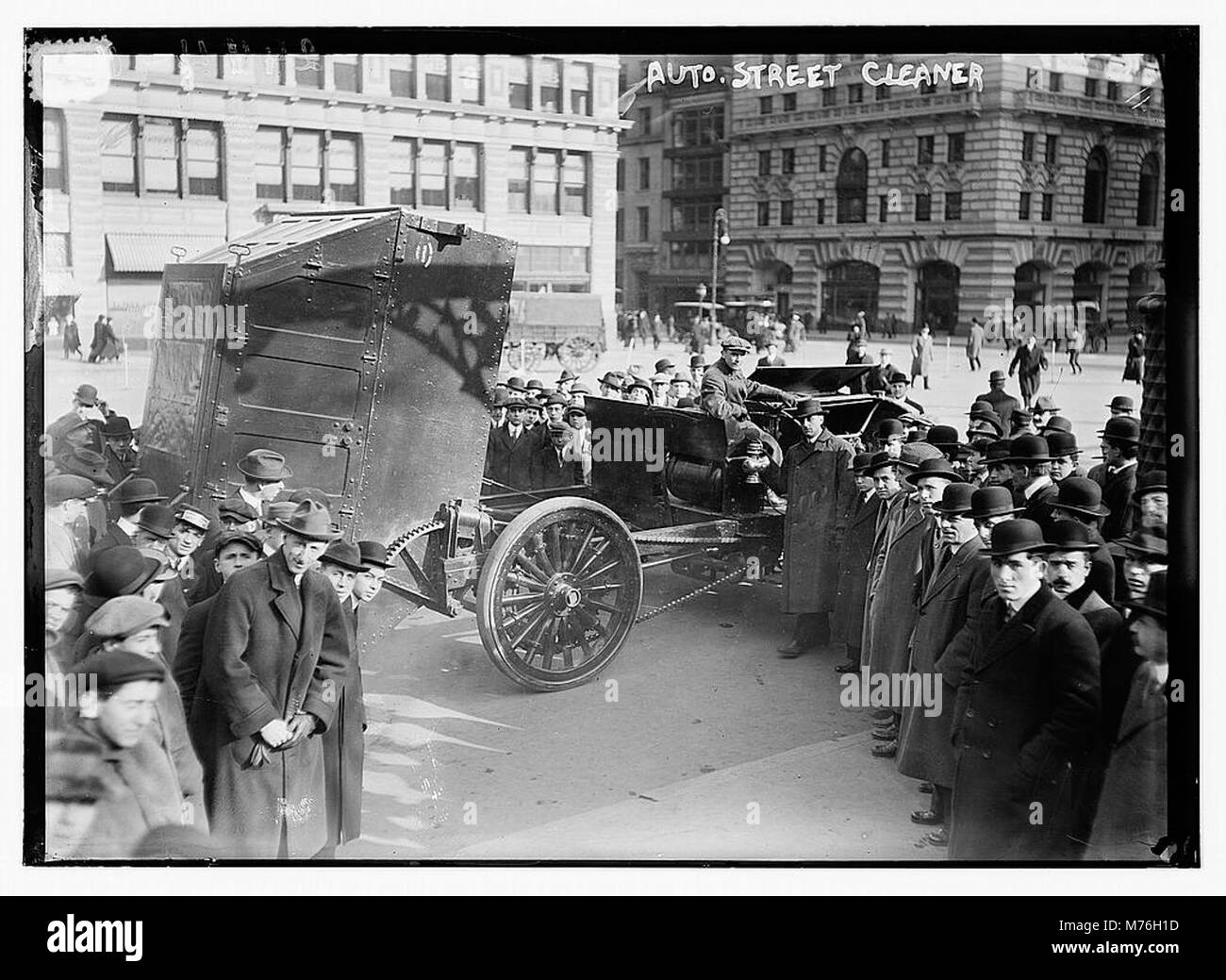 A photograph of an early 20th-century auto street cleaner, a machine ...