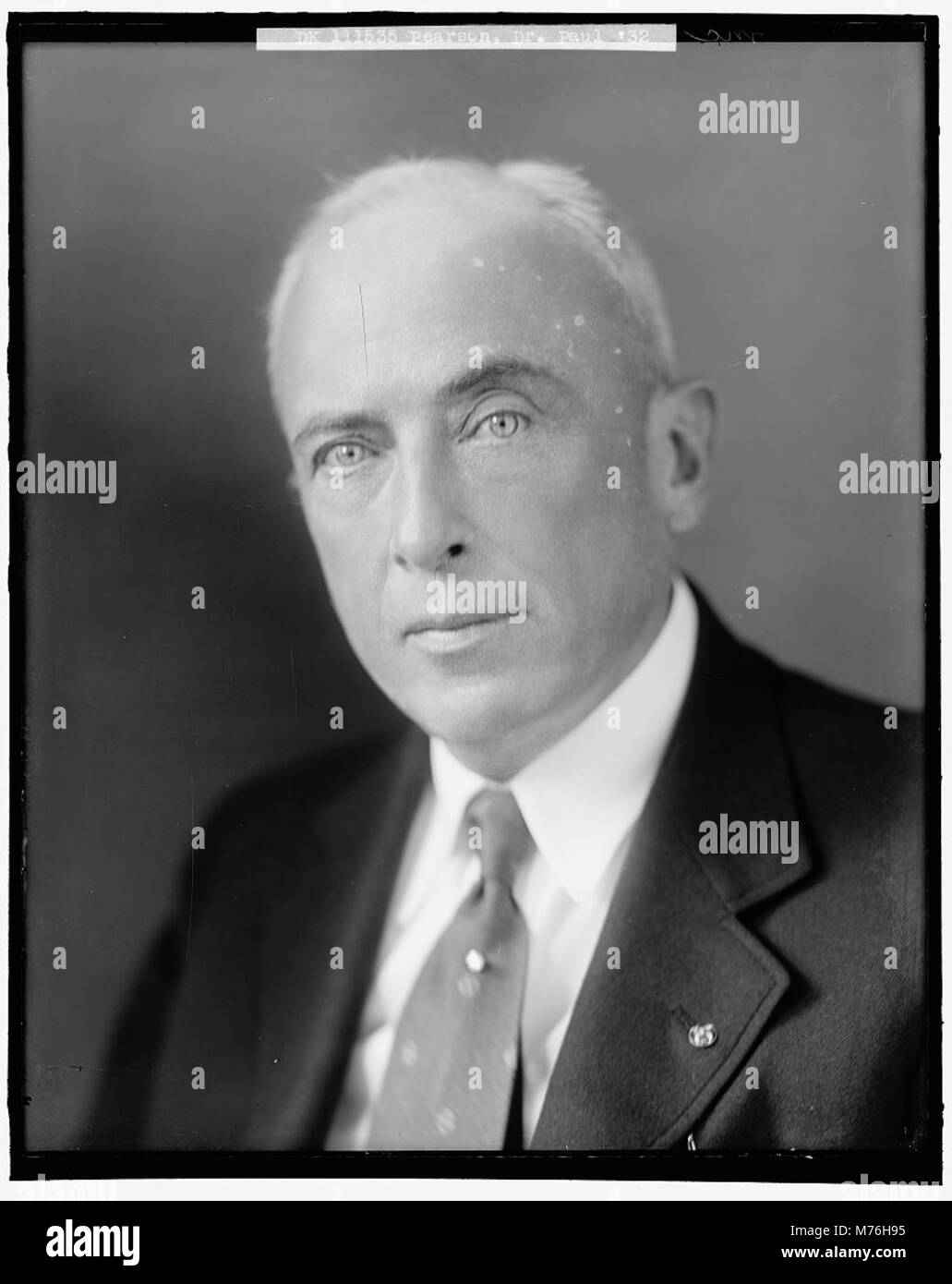 Portrait of Dr. Paul Pearson, identified as a doctor. The image ...