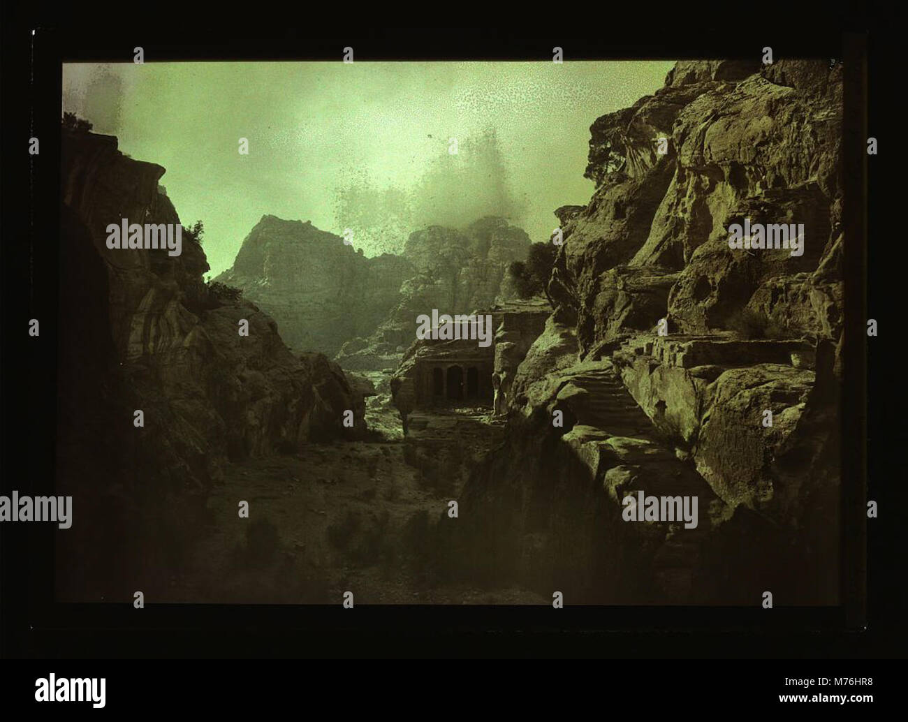 This photograph features the ancient city of Petra in Jordan ...