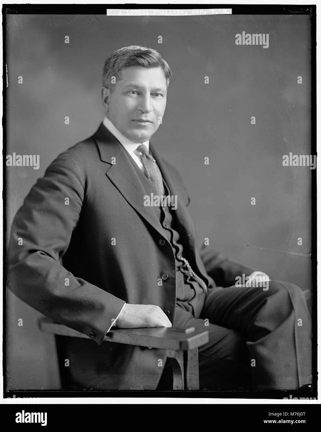This portrait features T.W. Phillips, an honorable public figure. The ...