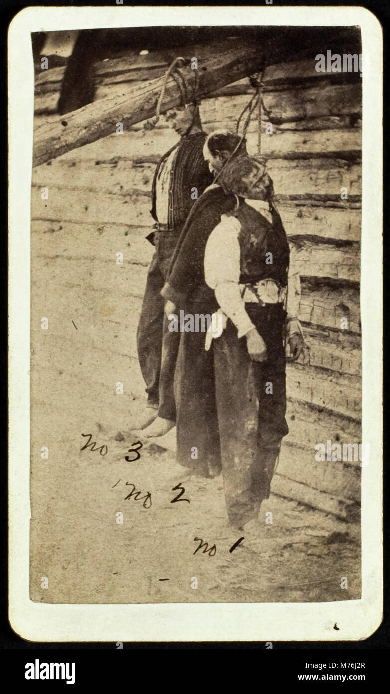 This image captures the vigilante hanging of Con Weiger, Asa Moore, and ...