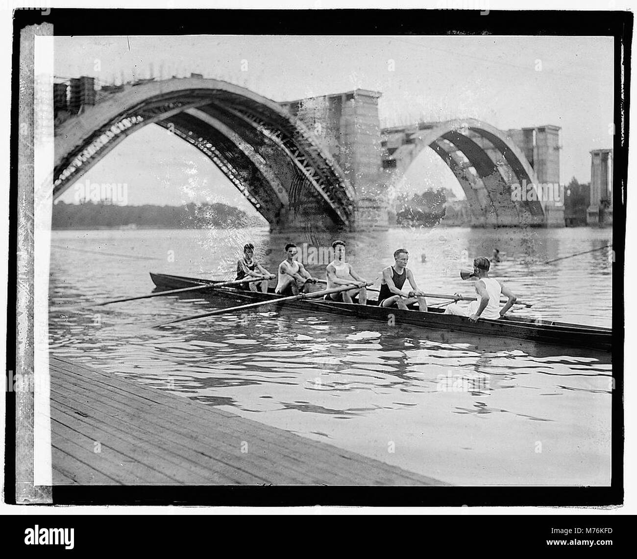 This photograph features the Potomac Boat Club, capturing its activity ...