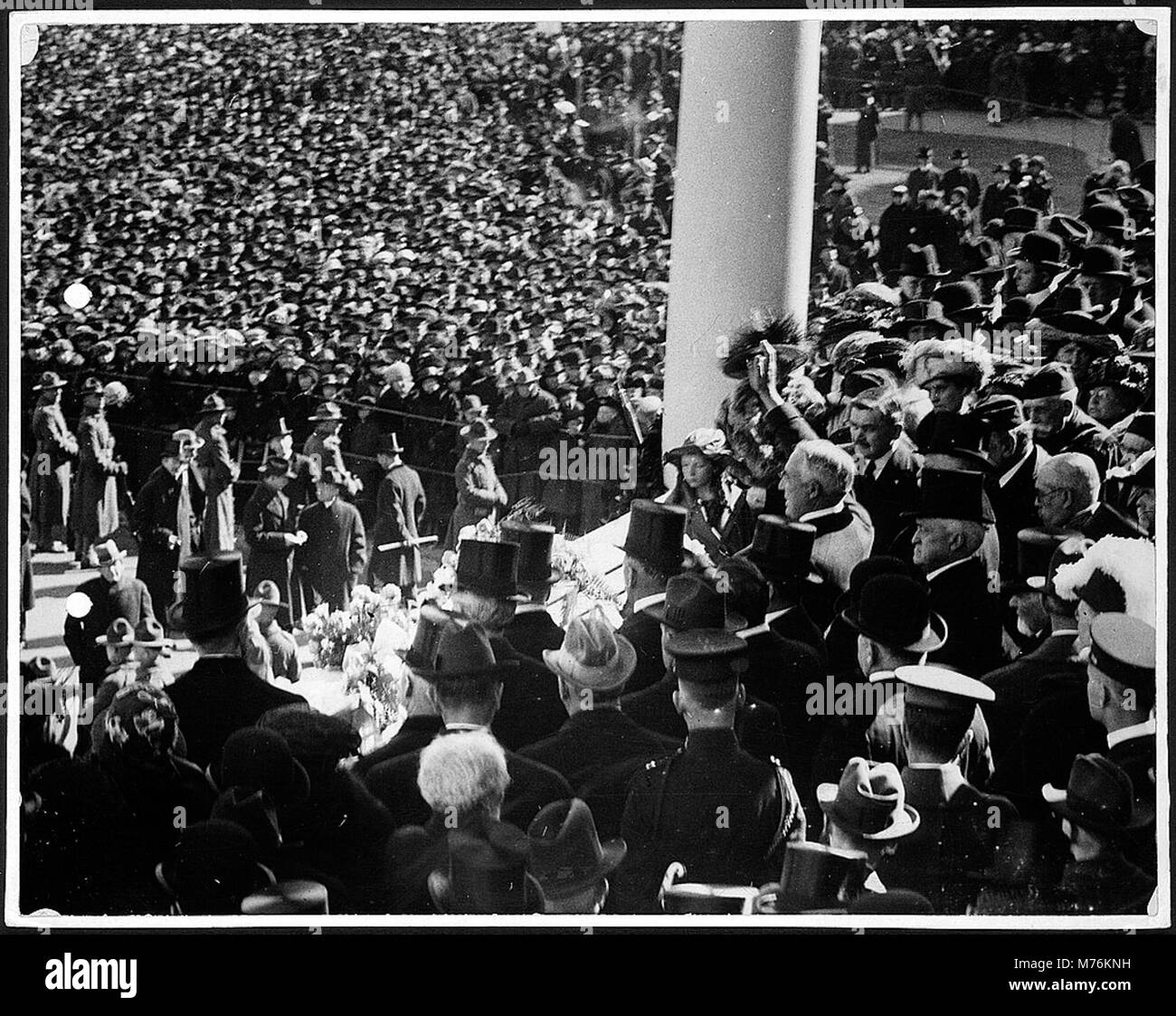 President Harding waving to crowd, from inaugural stand on east portico ...