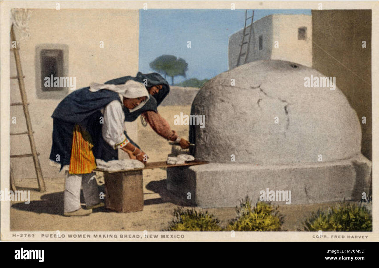 An image of Pueblo women preparing bread, a traditional craft ...
