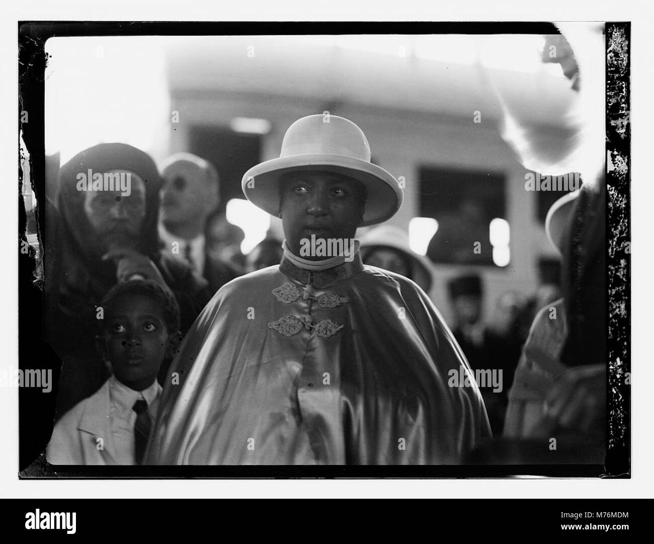 This image depicts the Queen of Abyssinia (Ethiopia) in 1933, offering ...