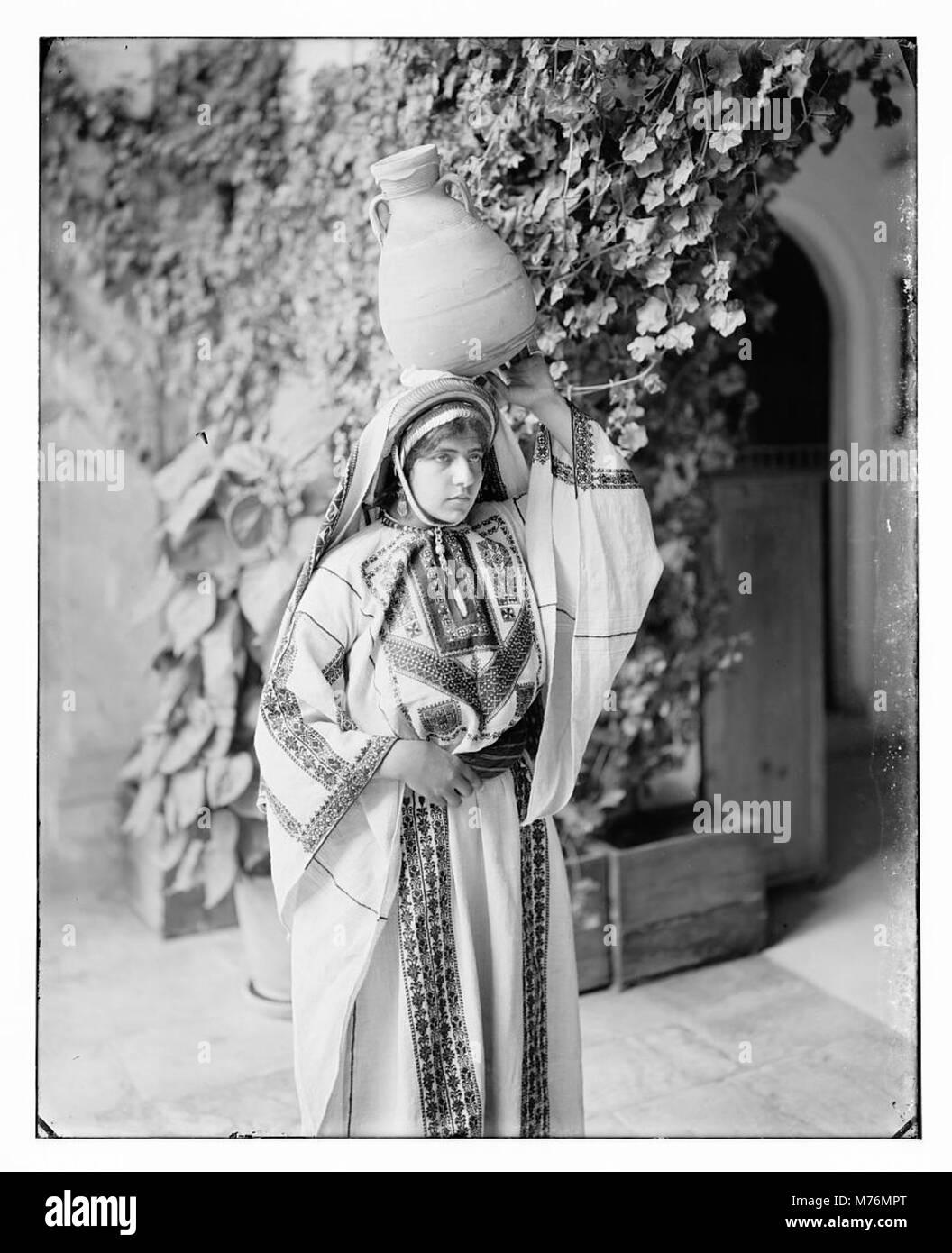 A portrait of a woman from Ramallah, a city in Palestine, depicting her ...