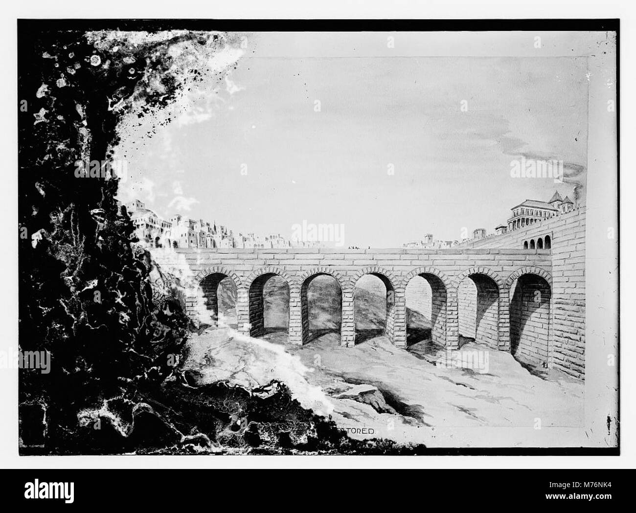A photograph documenting the restoration efforts of Robinson's Arch in ...