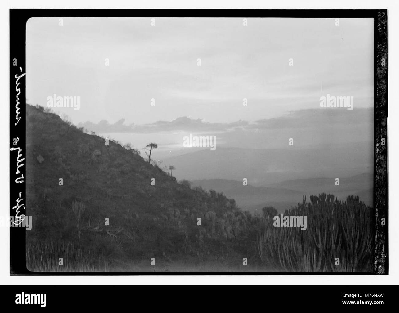 A photograph of a sunset over the Rift Valley, capturing the dramatic ...