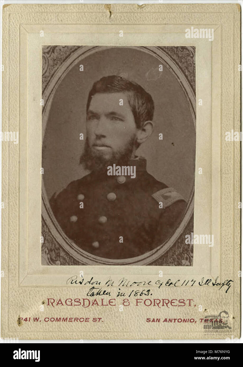 Portrait of Risdon M. Moore, captured in a formal historical photograph ...