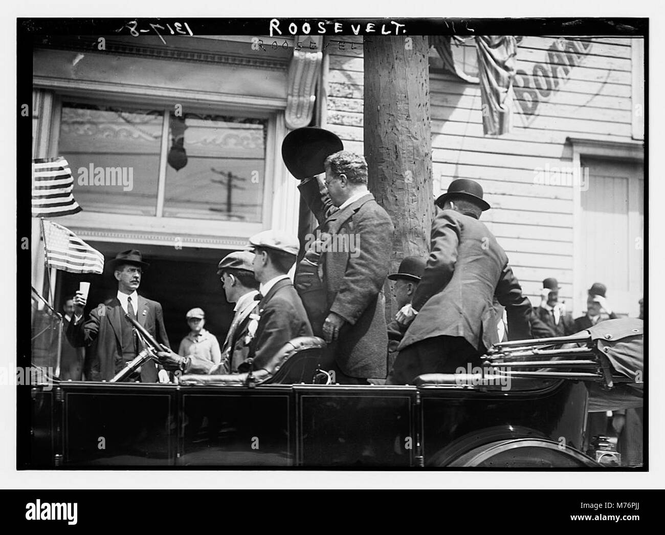 This image shows President Franklin D. Roosevelt in a car, likely ...
