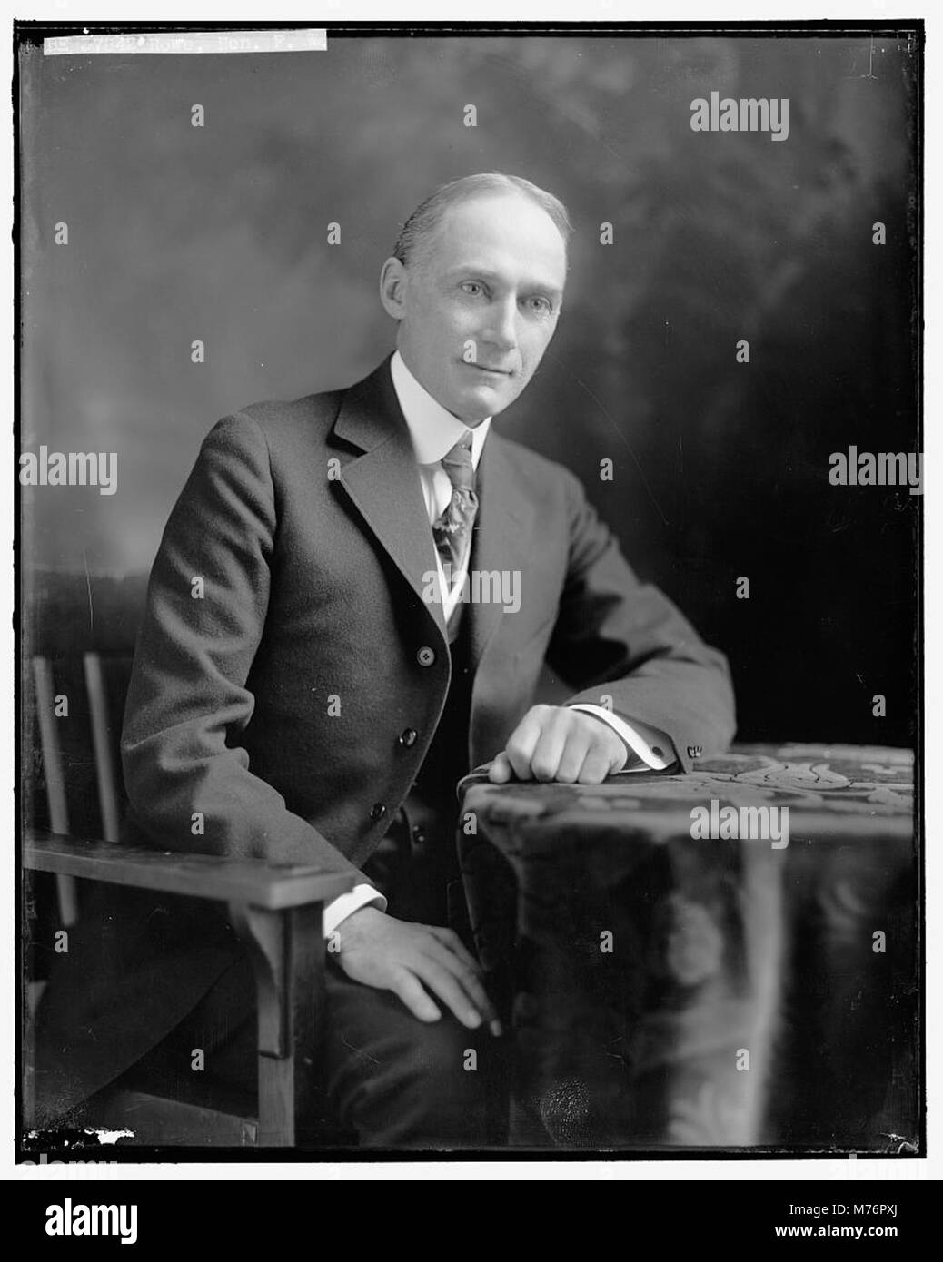 A formal portrait of Honorable F.W. Rowe, depicting his dignified ...