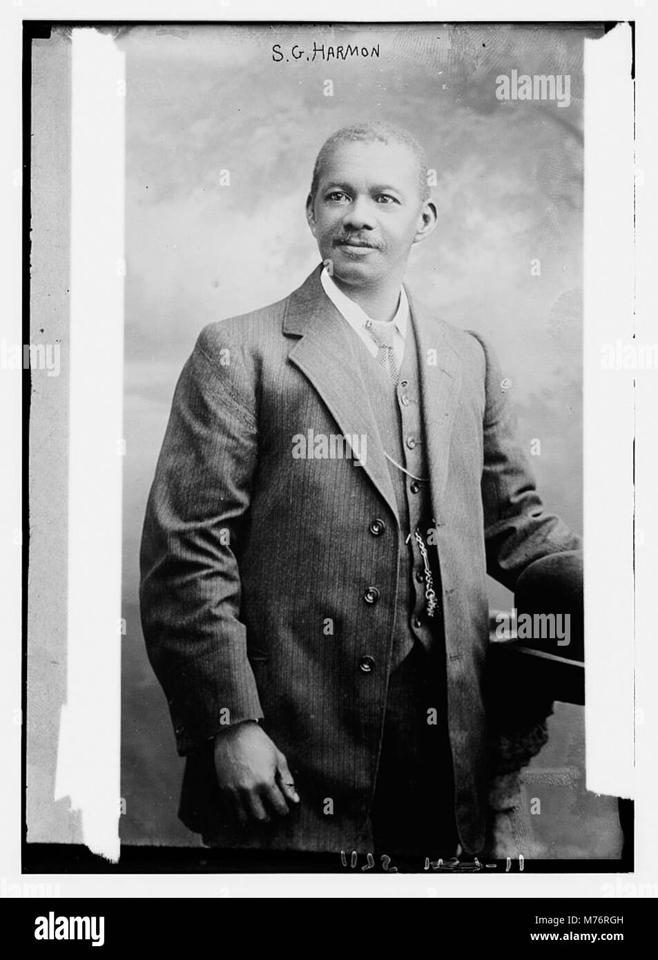 S.G. Harmon is depicted in this portrait, capturing the likeness of a ...