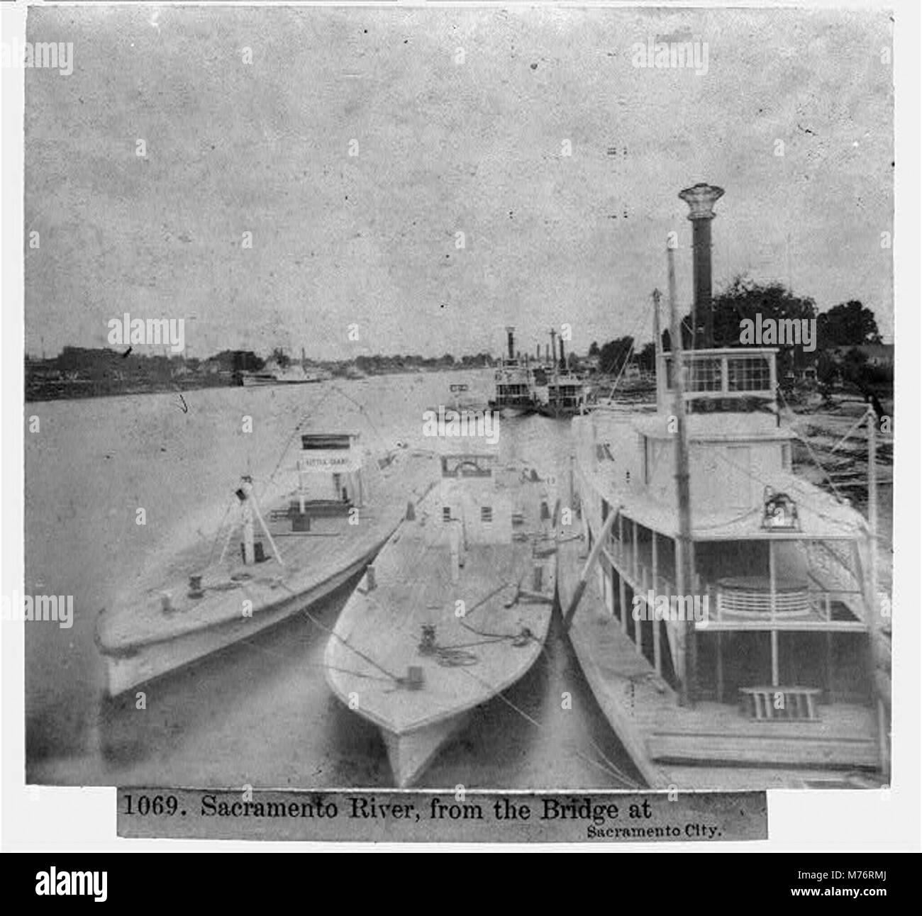 This image depicts the Sacramento River as seen from a bridge in ...