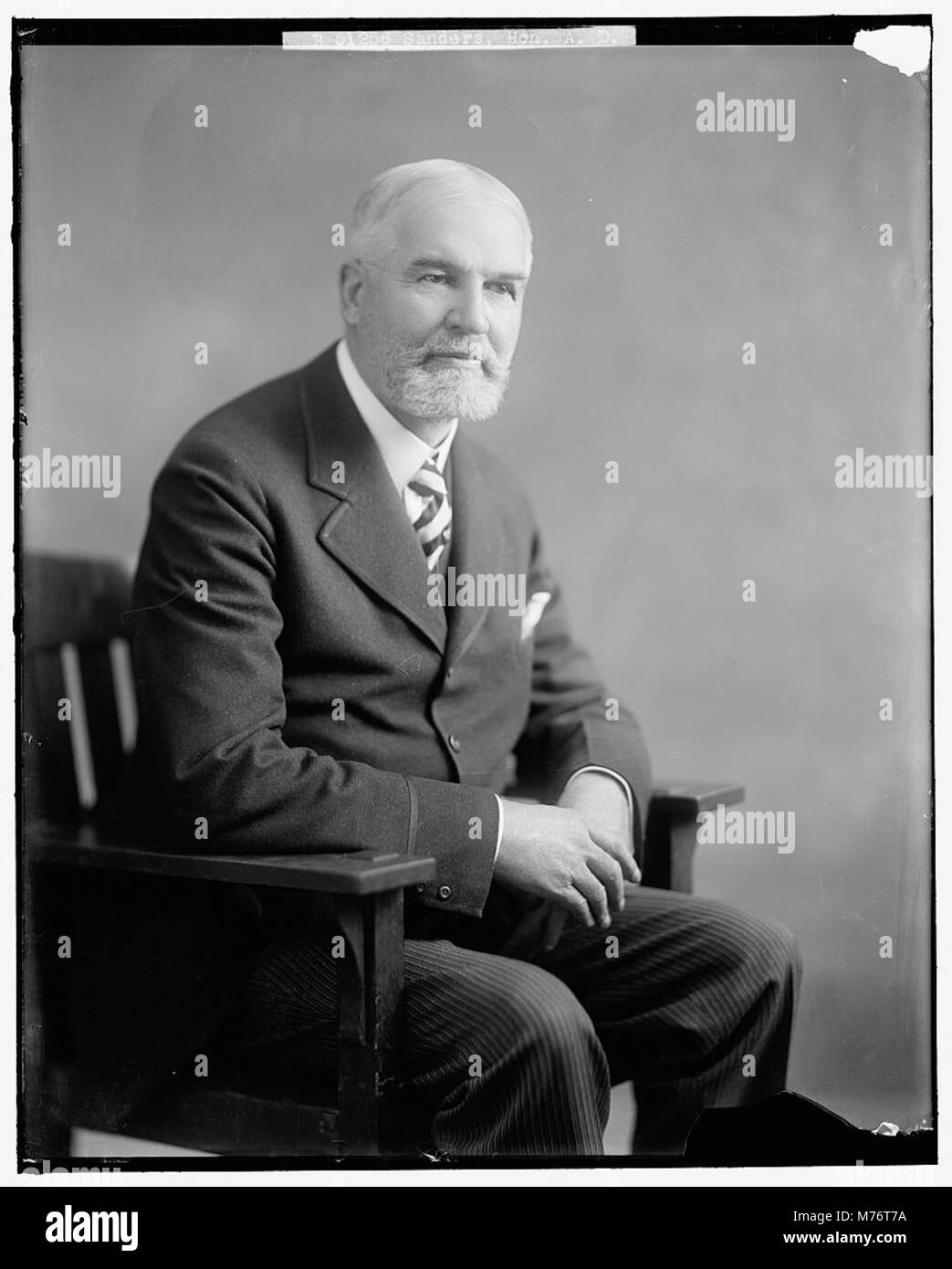 A portrait of Honorable A.D. Sanders, capturing his formal appearance ...