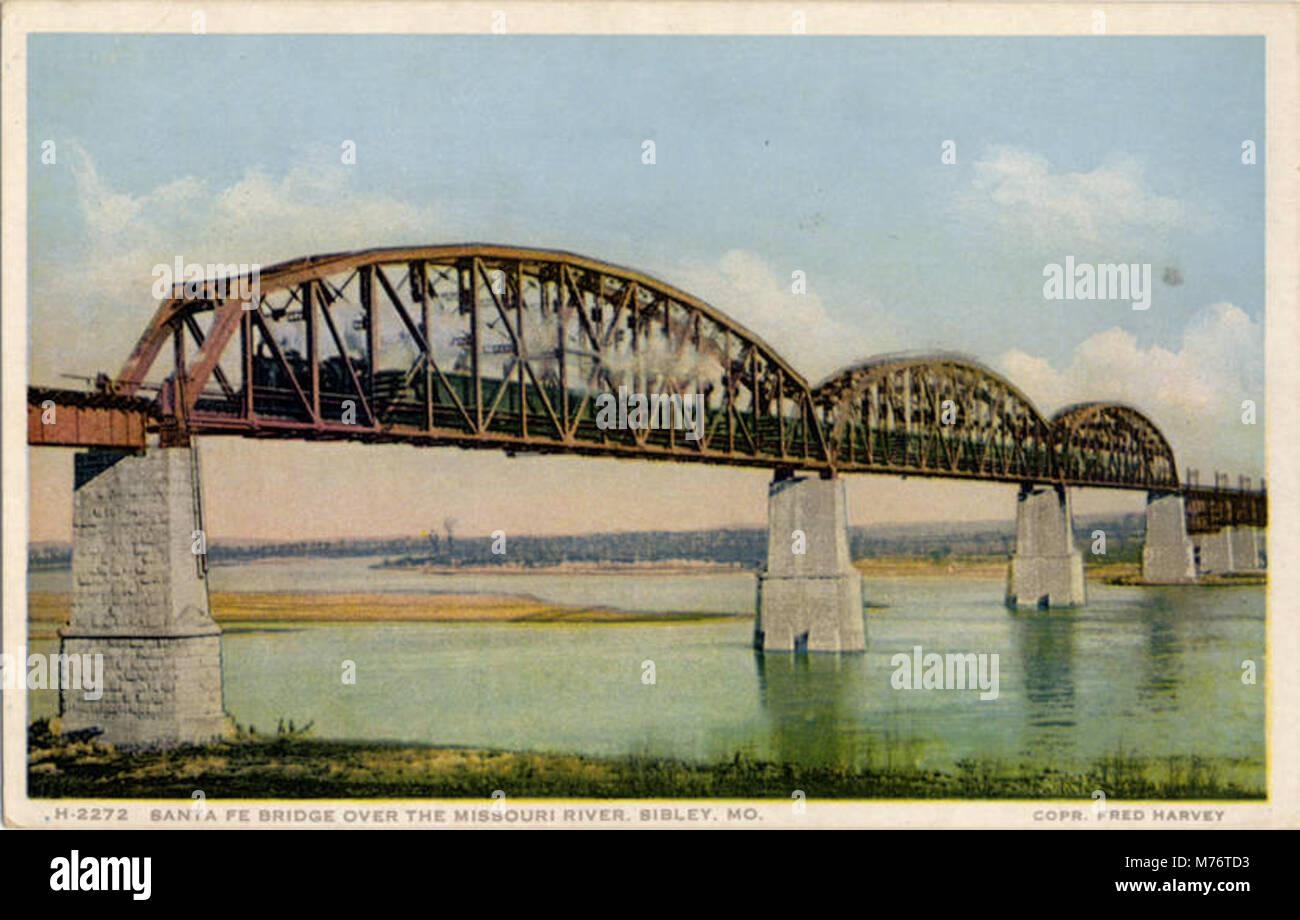 A vintage photograph of the Santa Fe Bridge spanning the Missouri River ...