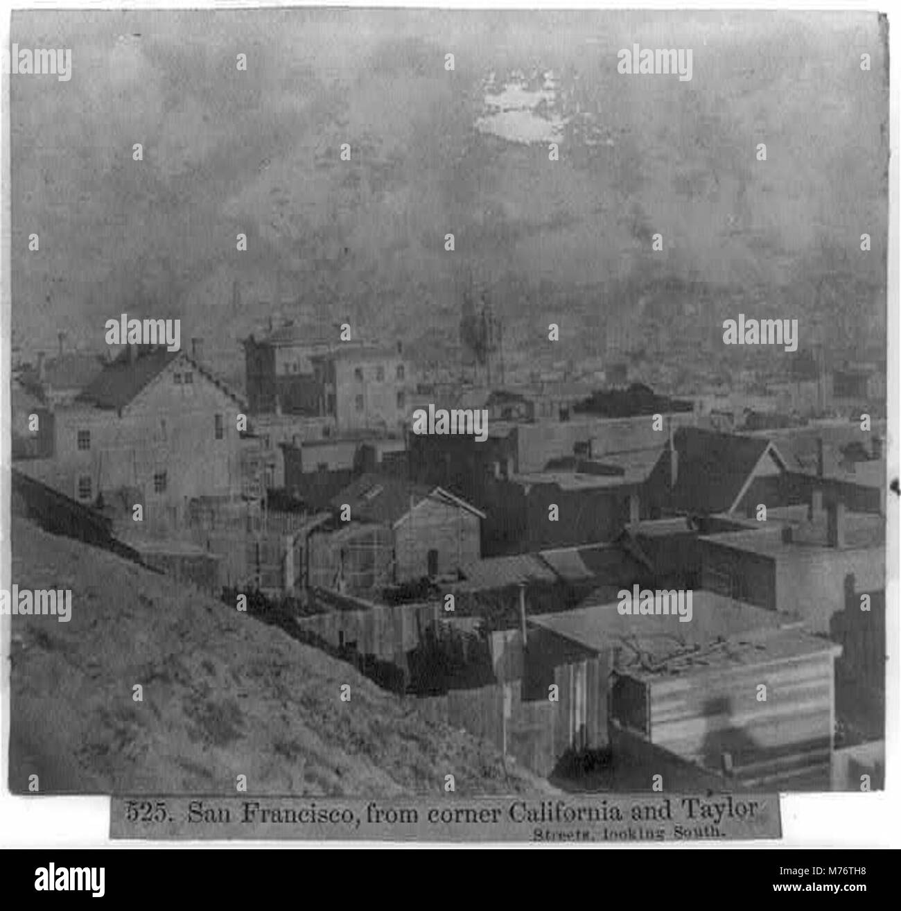 This photograph captures a view of San Francisco from the intersection ...