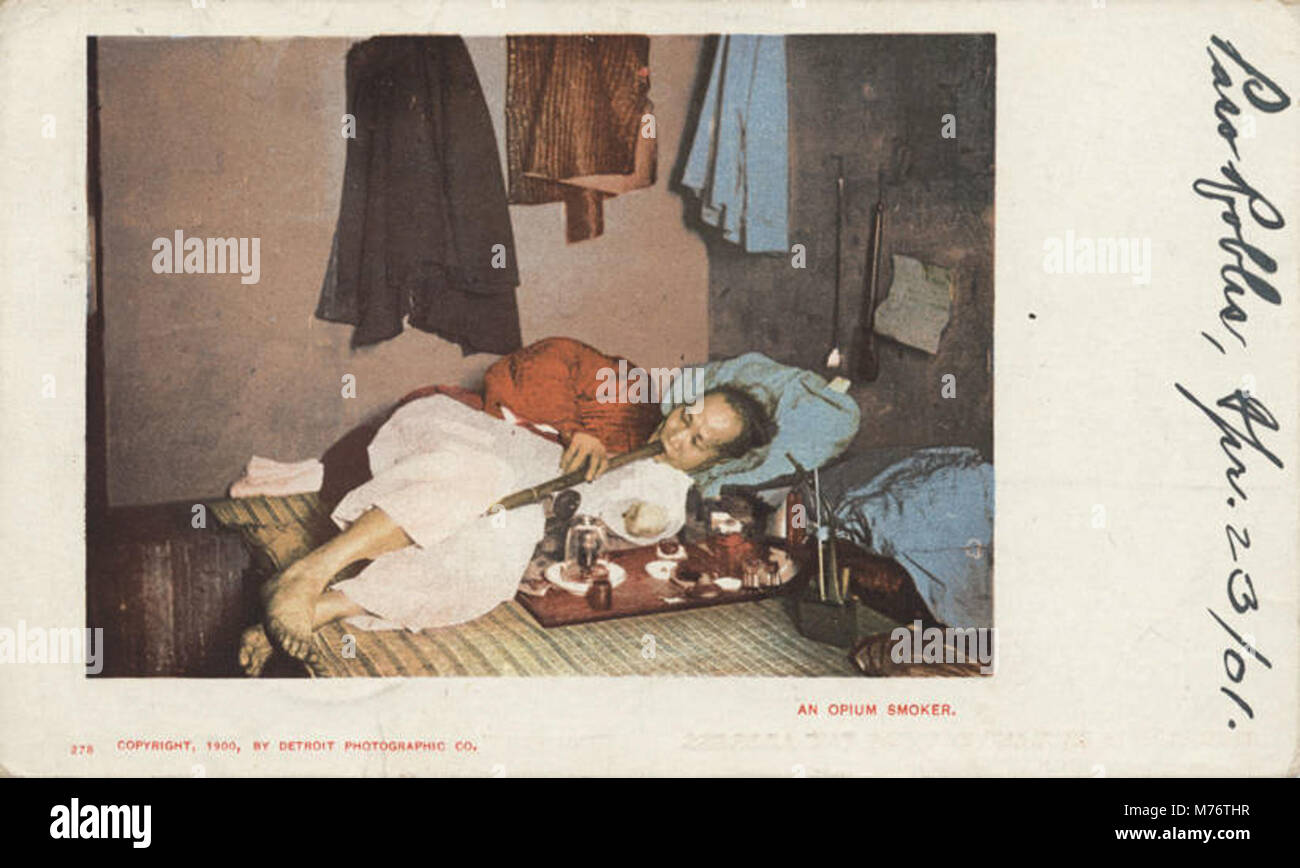 A historical image showing an individual smoking opium in San Francisco ...