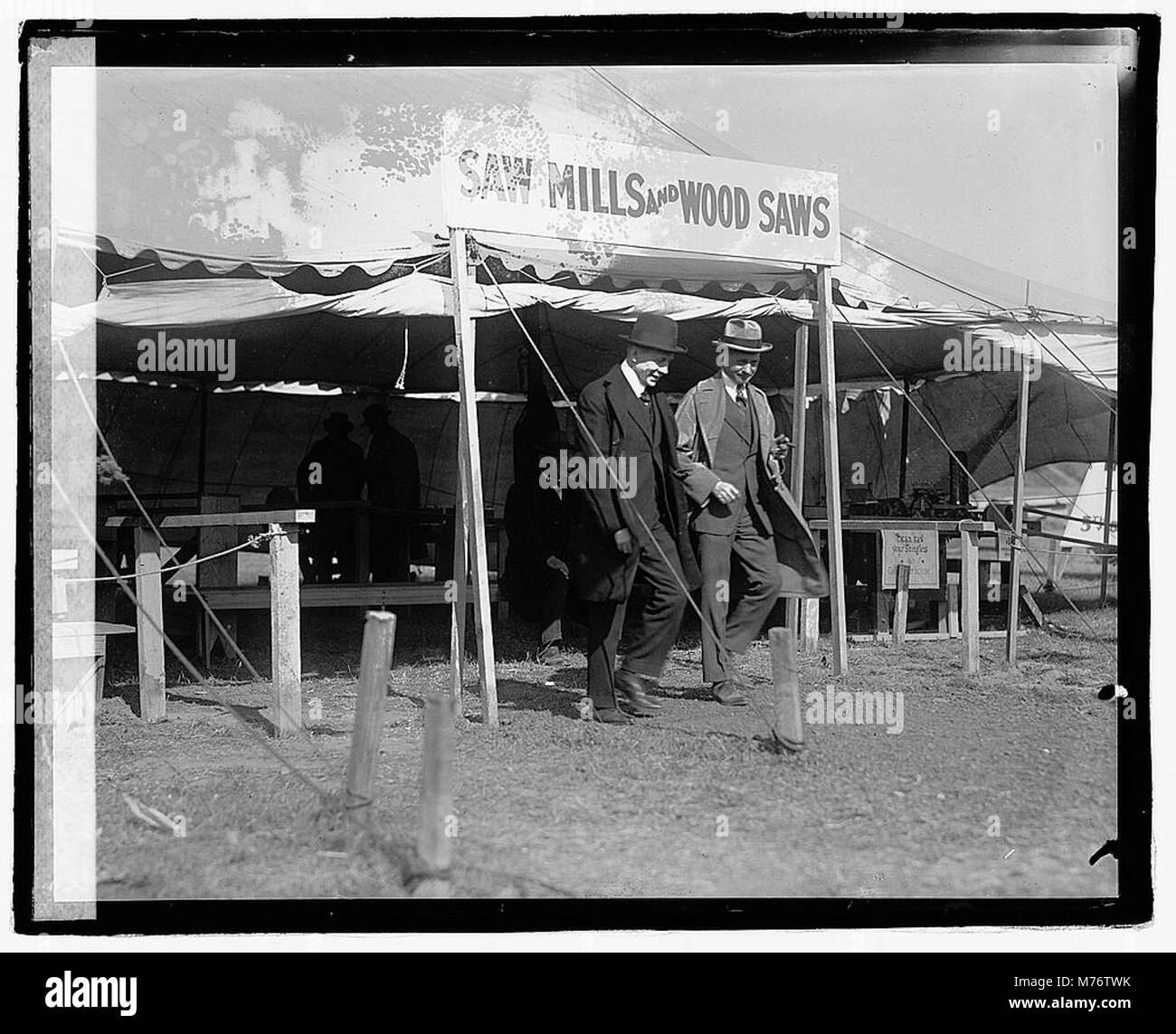 A historical photograph showing saw mills and wood saws, depicting the ...