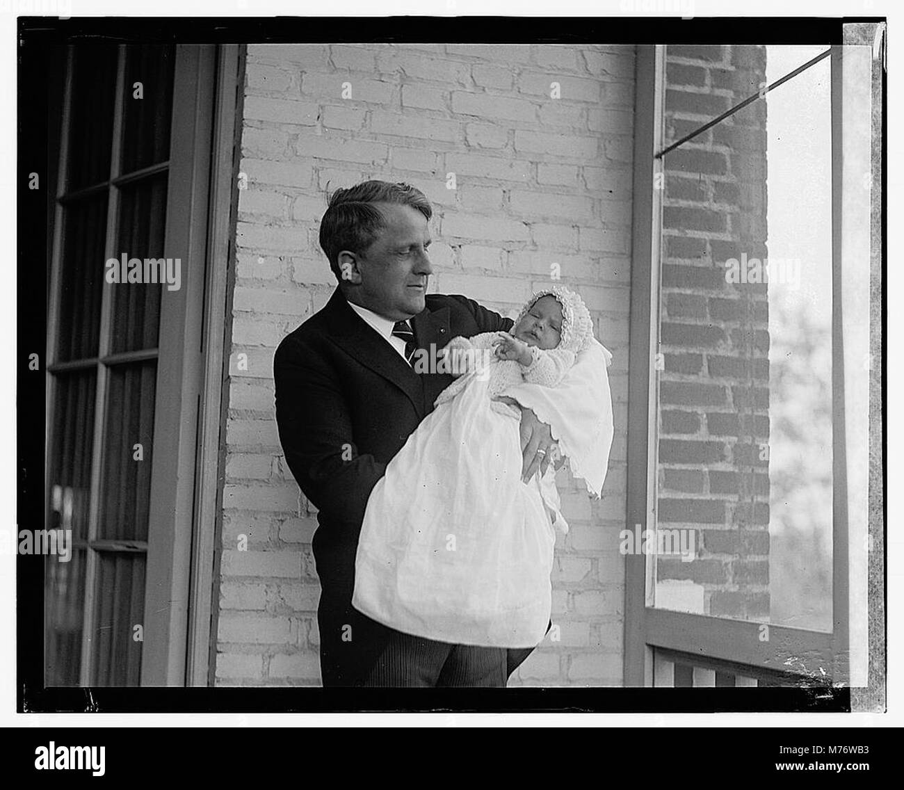 A photograph of Secretary Davis and Jean Allys, likely captured in a ...