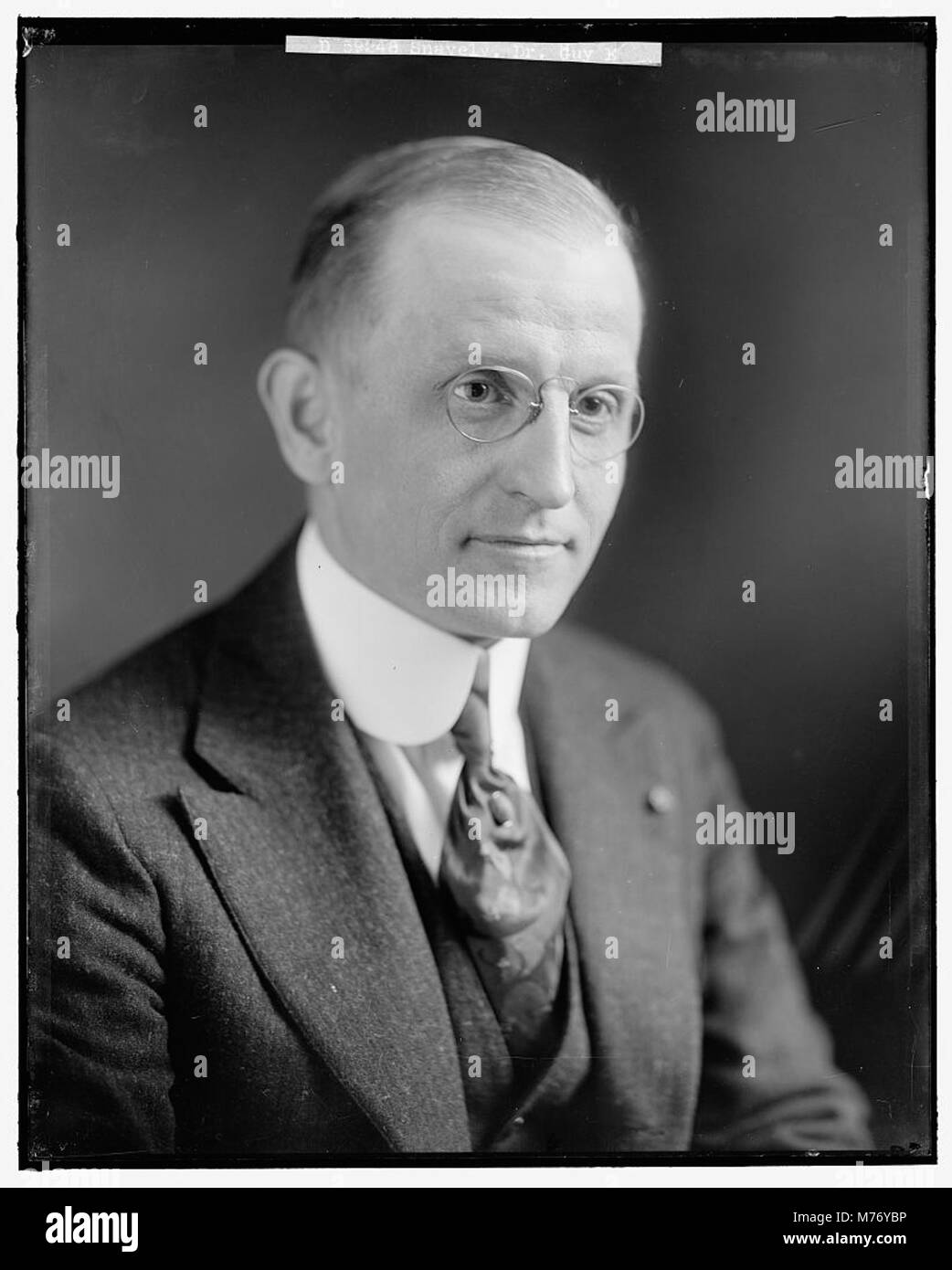 A portrait photograph of Dr. Guy E. Snavely, a prominent physician ...