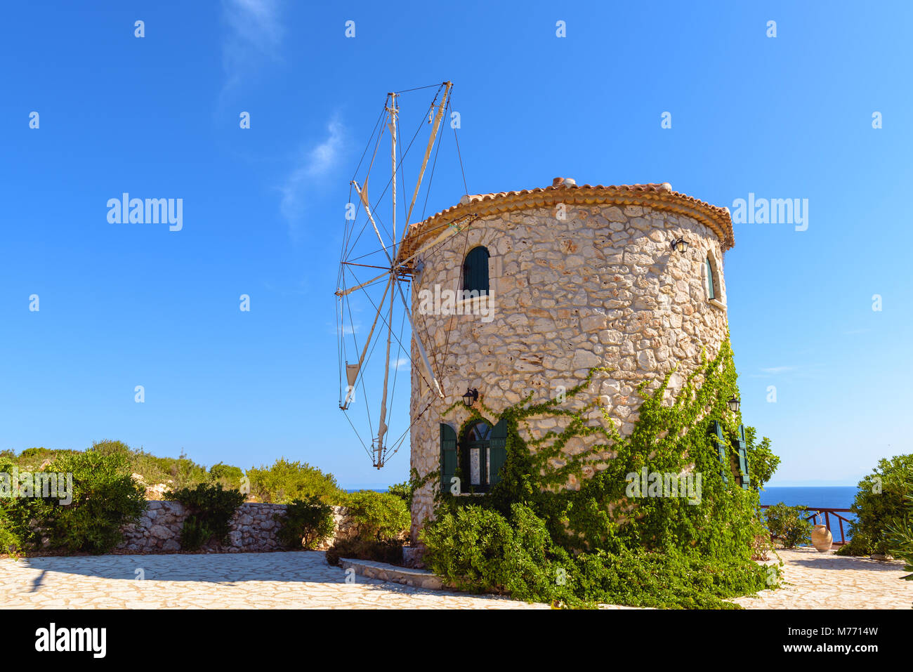 Traditional Greek old windmill on Skinari cape. Zakynthos island ...