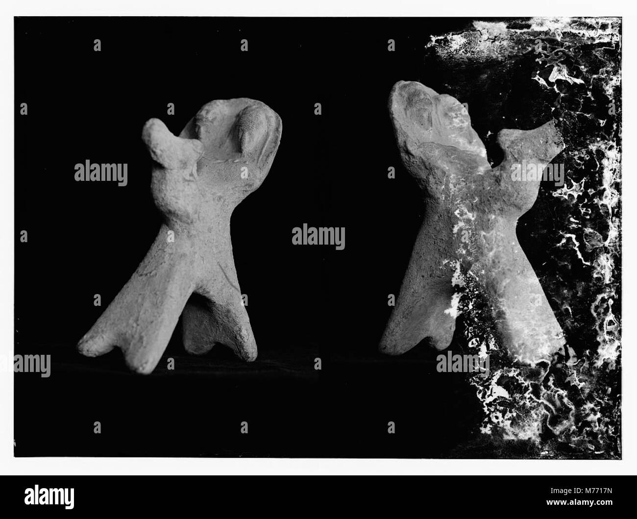 A collection of stone objects, likely from an archaeological site. The ...