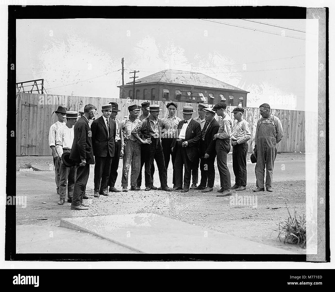 A historical photograph depicting railroad workers on strike ...