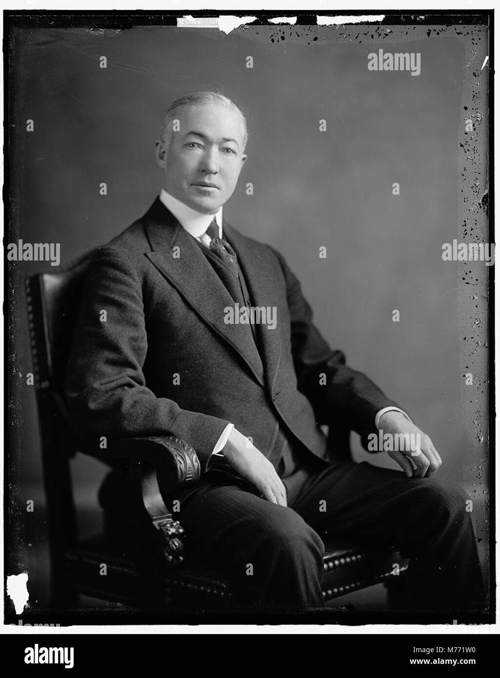 A formal portrait of Christopher Sullivan, a notable figure recognized ...