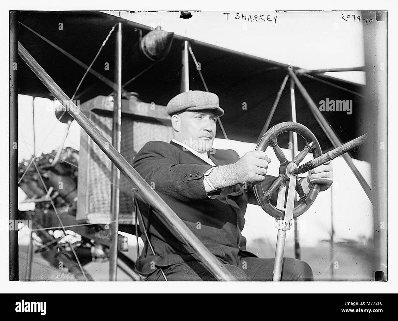 A portrait of T. Sharkey, depicting his features and historical ...